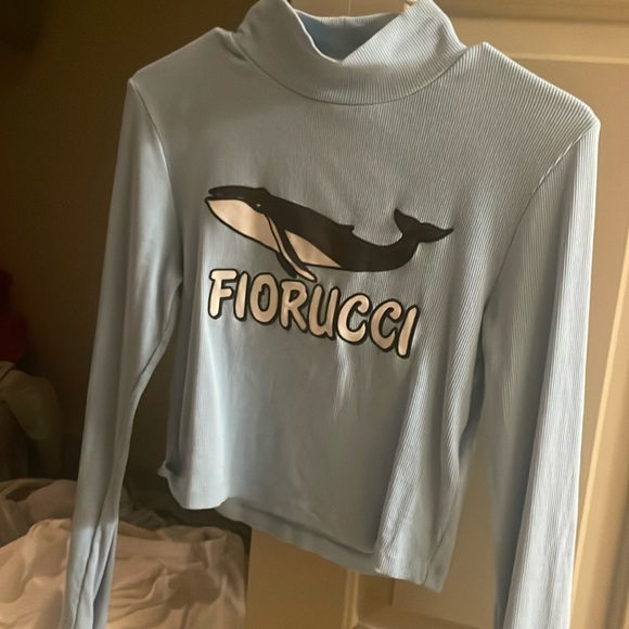 Fiorucci | Tops | Doric Whale Turtleneck Top | Poshmark
